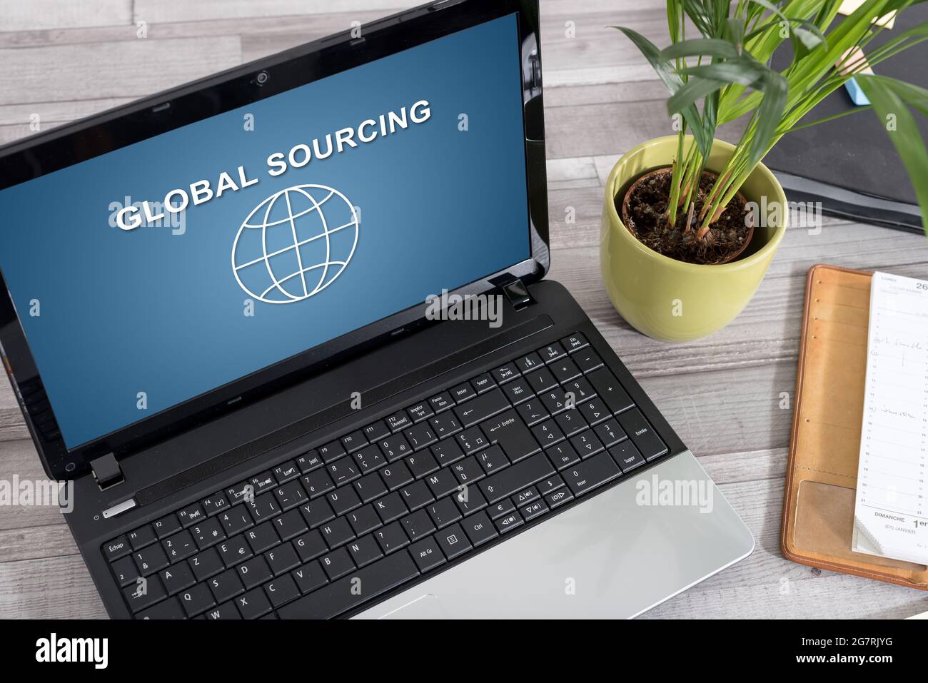 Laptop screen with global sourcing concept Stock Photo - Alamy