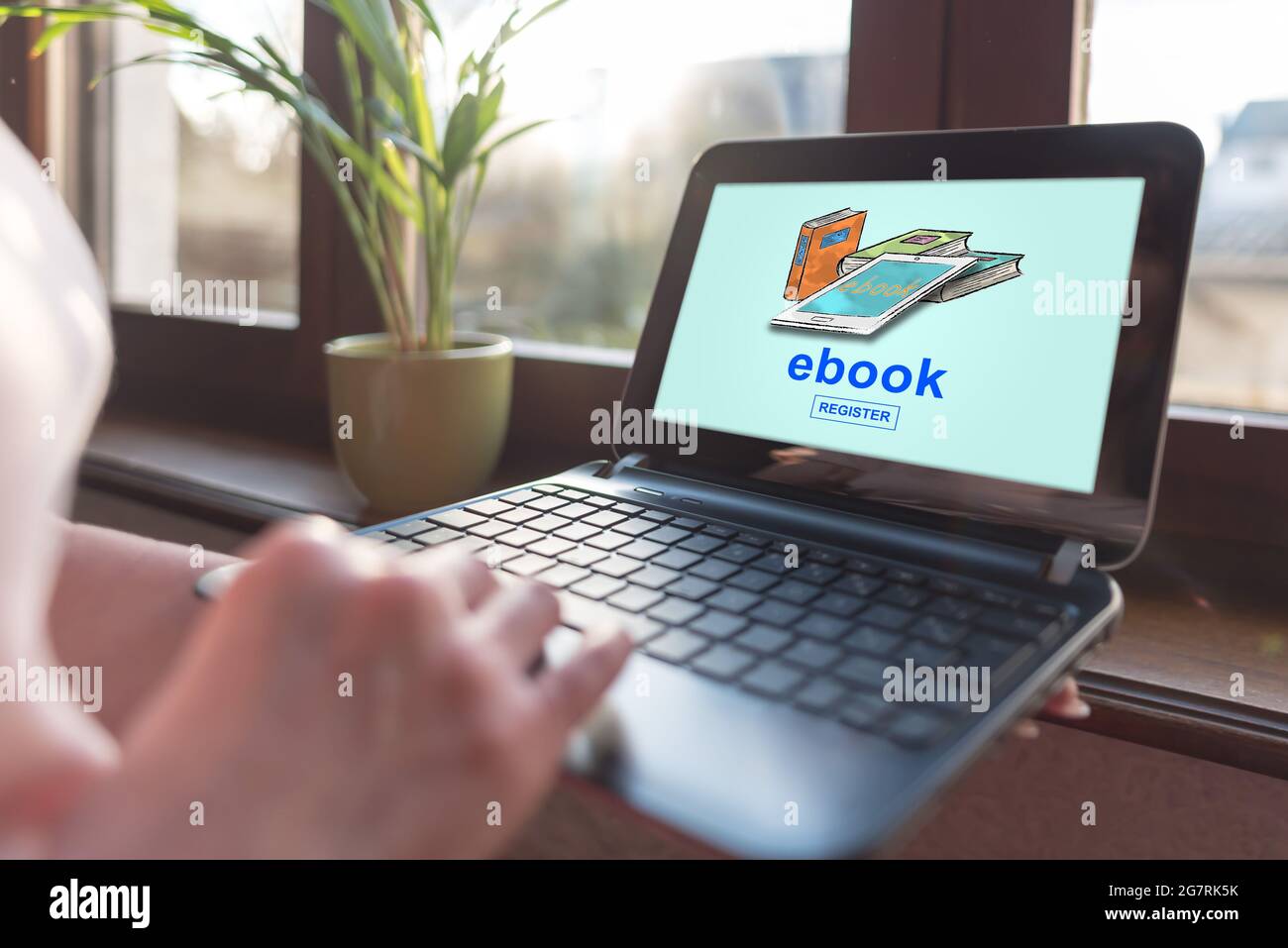 Laptop screen displaying an e-book concept Stock Photo - Alamy