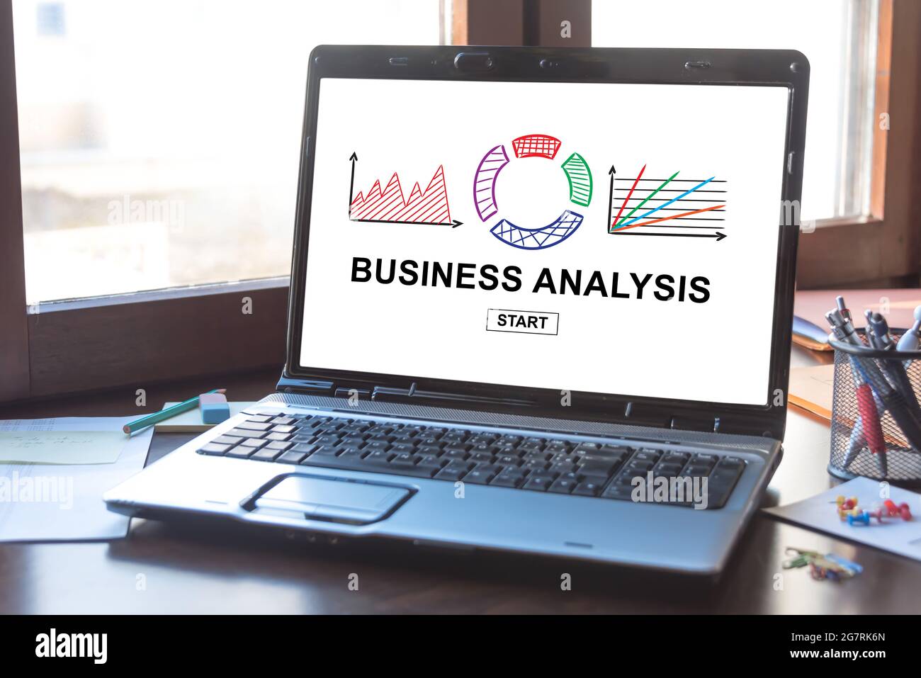 Laptop screen displaying a business analysis concept Stock Photo - Alamy