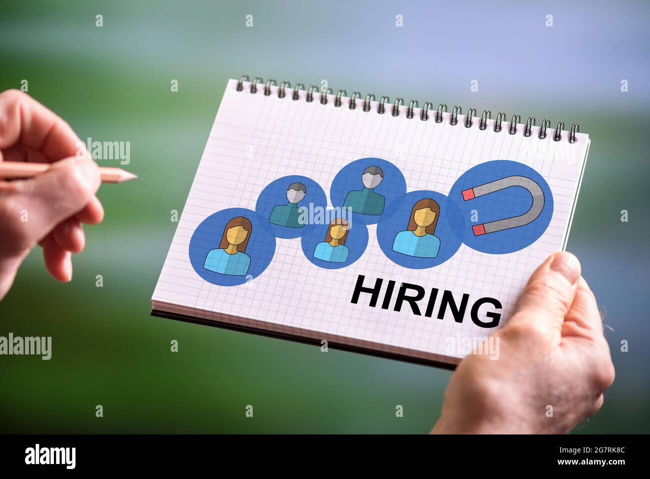 Hand drawing hiring concept on a notepad Stock Photo - Alamy