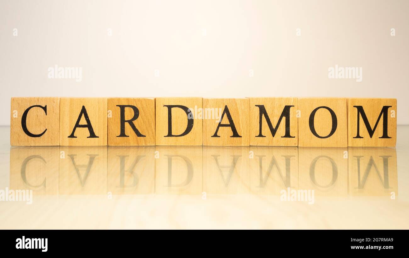 The word Cardamom was created from wooden letter cubes. Gastronomy and ...