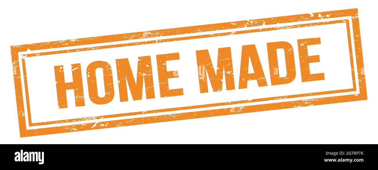 HOME MADE text on orange grungy vintage rectangle stamp Stock Photo - Alamy
