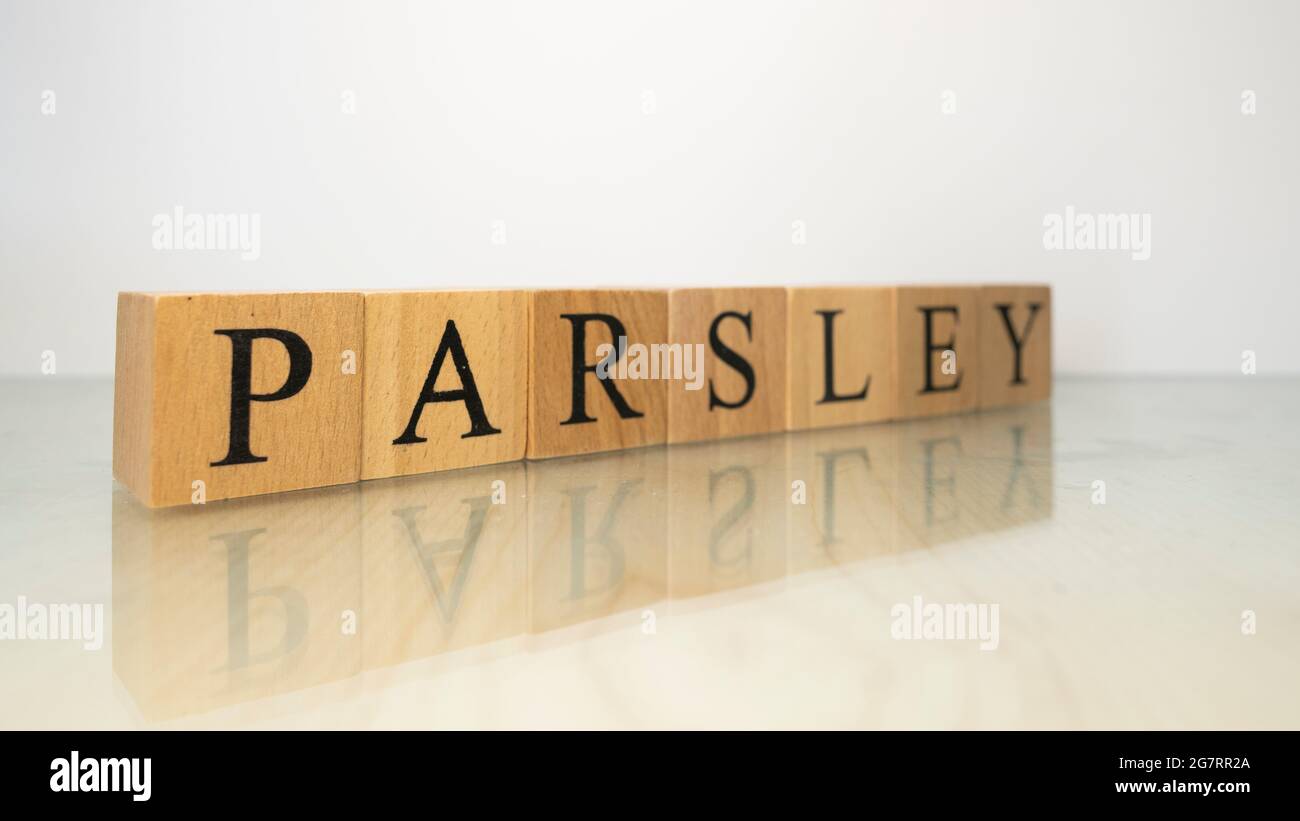 The word Parsley was created from wooden letter cubes. Gastronomy and ...