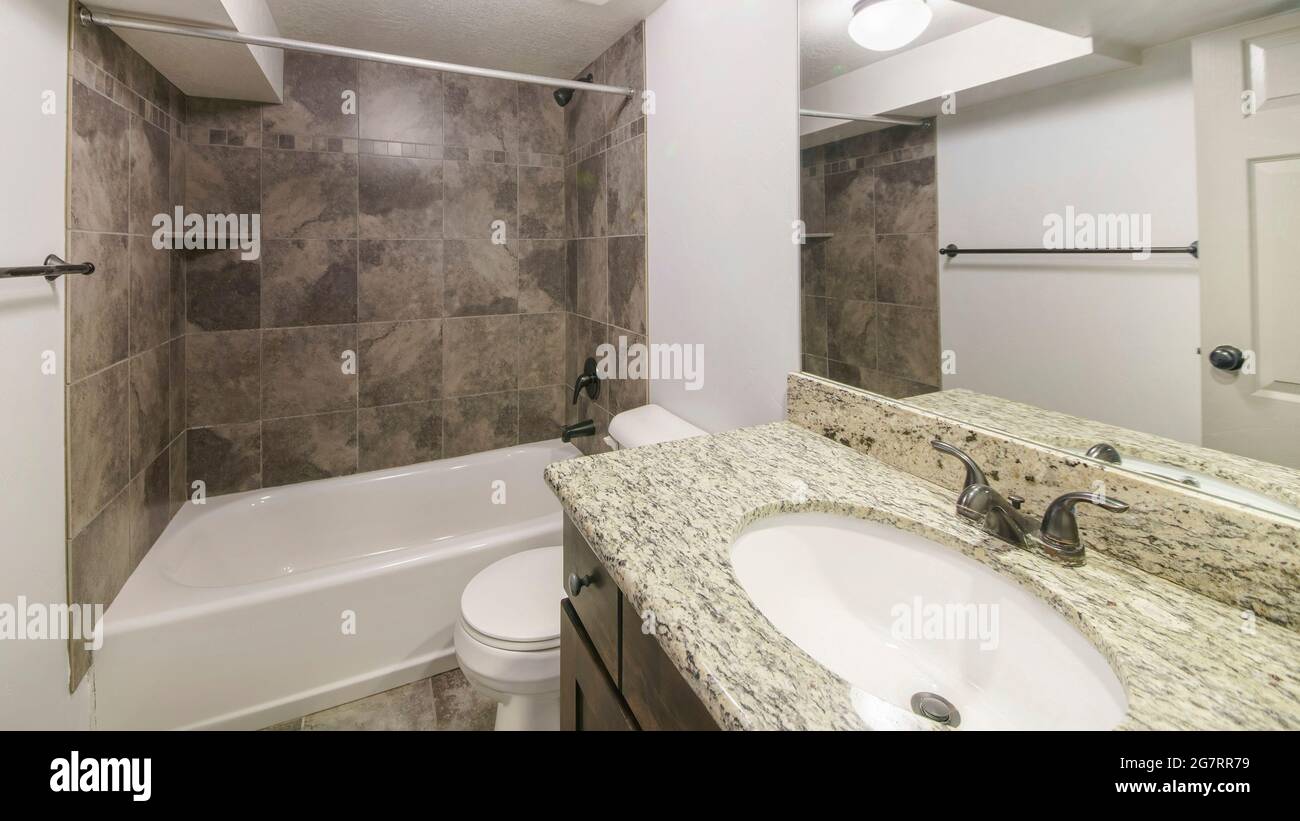 Pano Interior of a small bathroom with white walls and tiles Stock ...