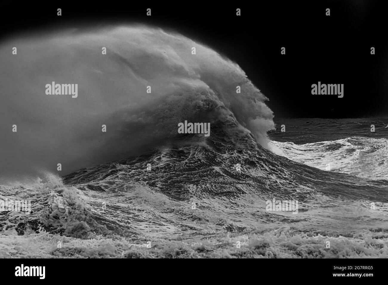 Grayscale shot of a sea wave Stock Photo - Alamy