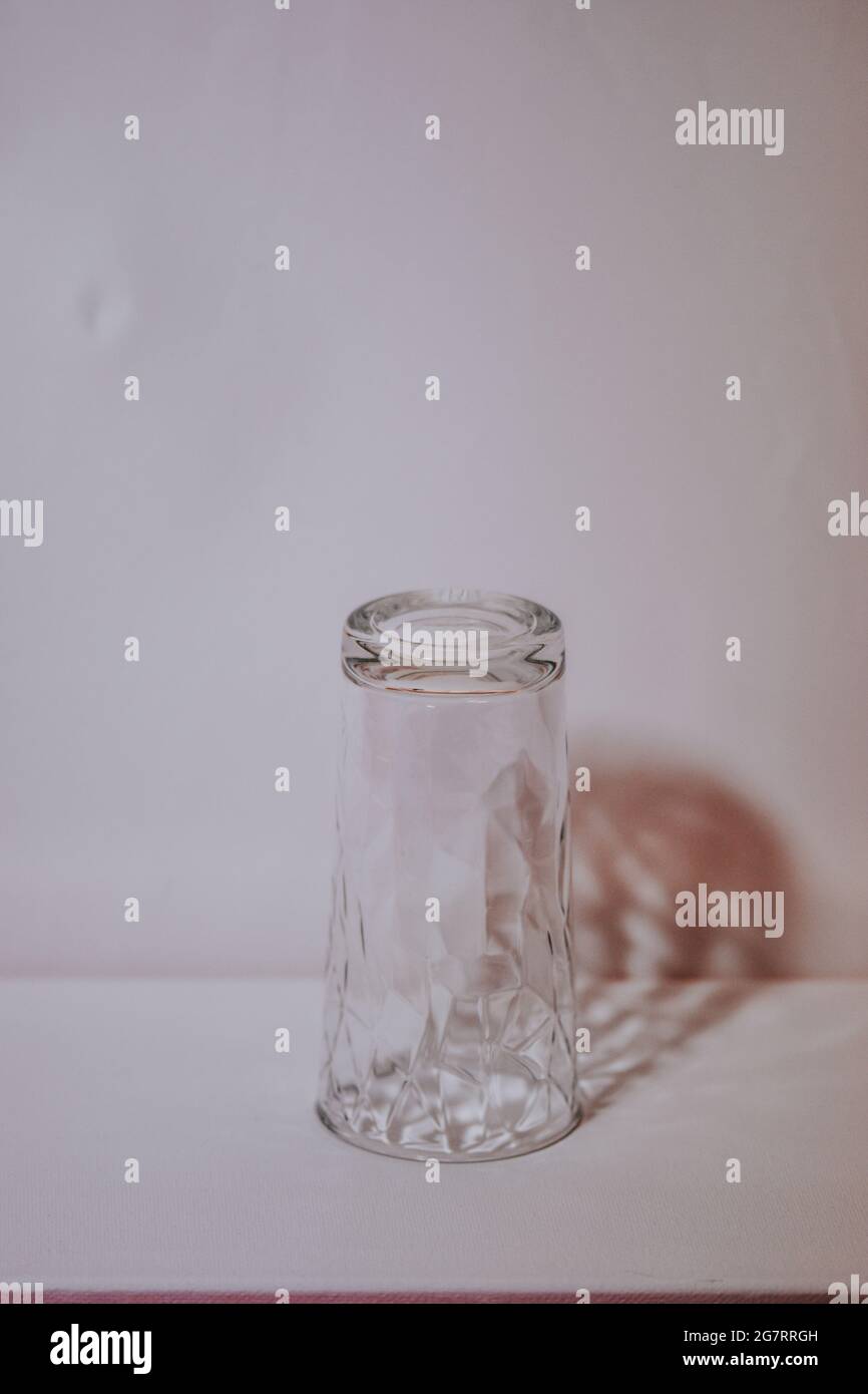 Glass jar and its shadow on the wall Stock Photo - Alamy