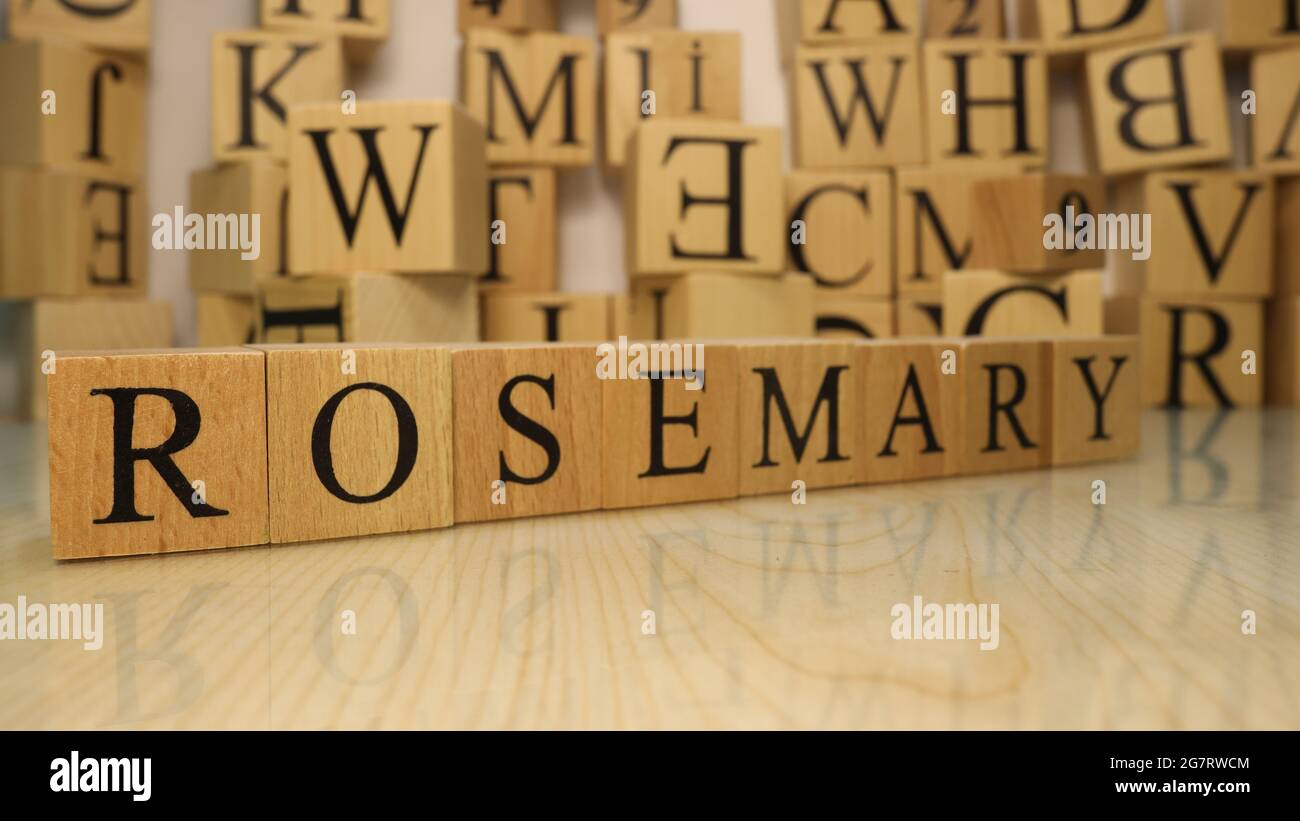 The word Rosemary was created from wooden letter cubes. Gastronomy and ...