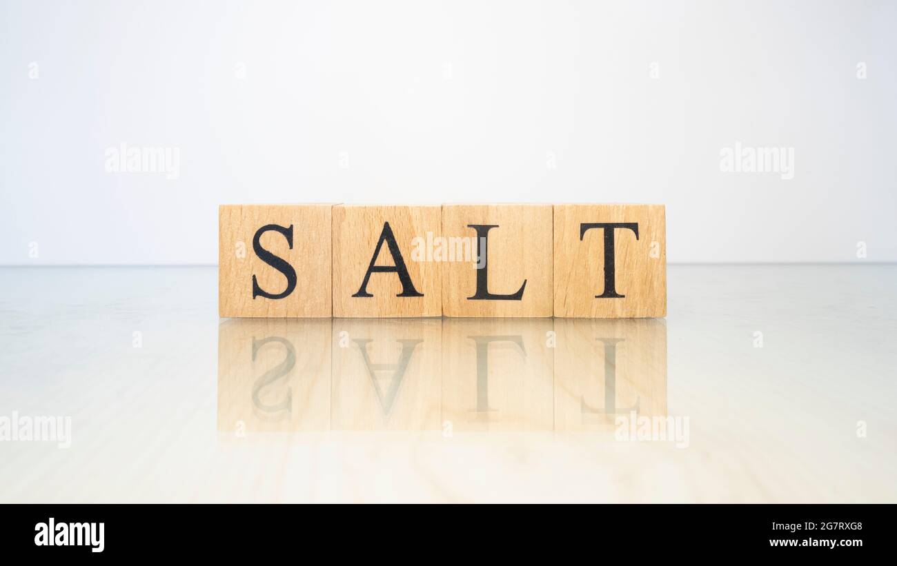 The word salt was created from wooden letter cubes. Gastronomy and ...