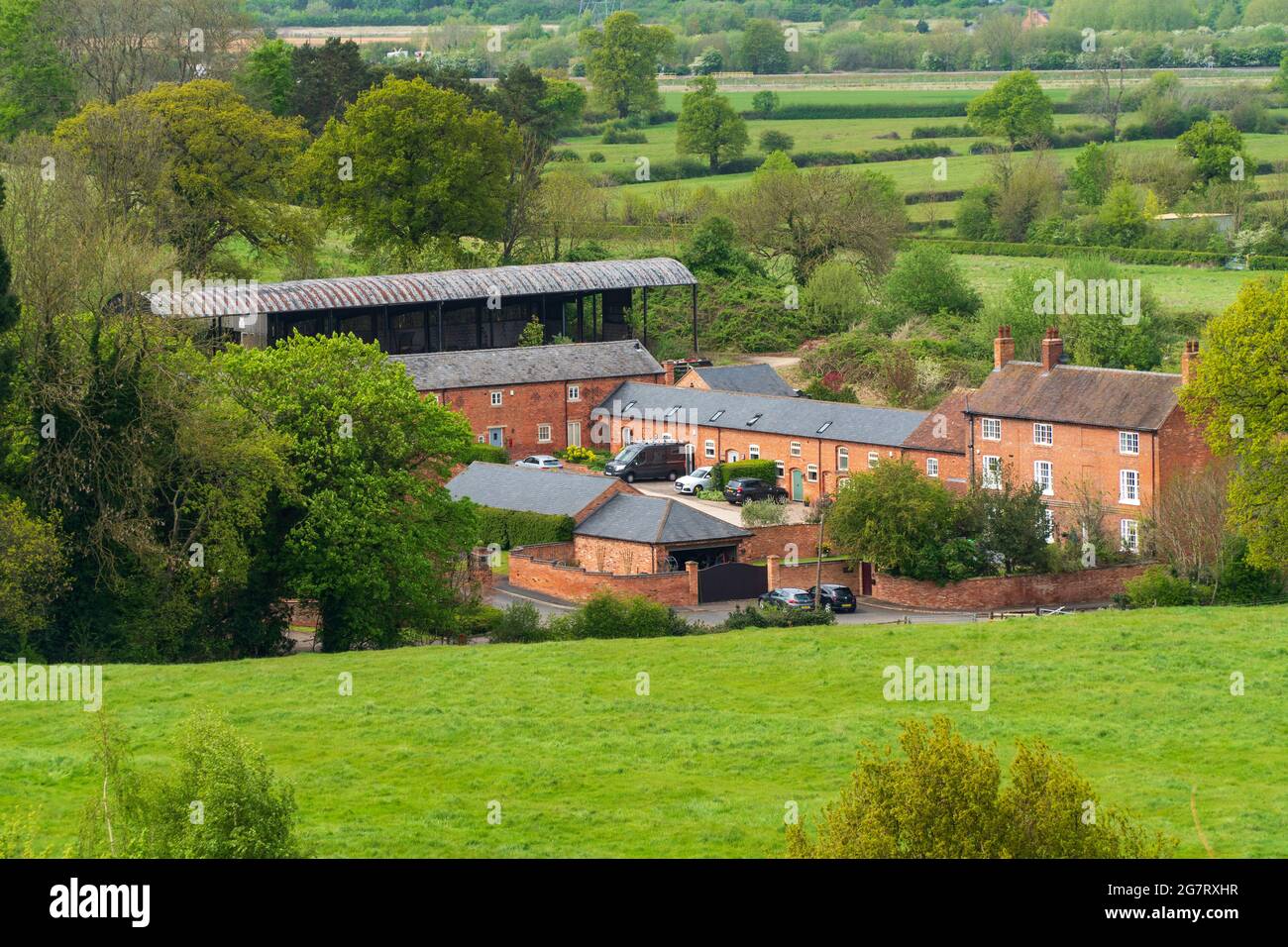 Barn buildings in a distant village Stock Photo - Alamy