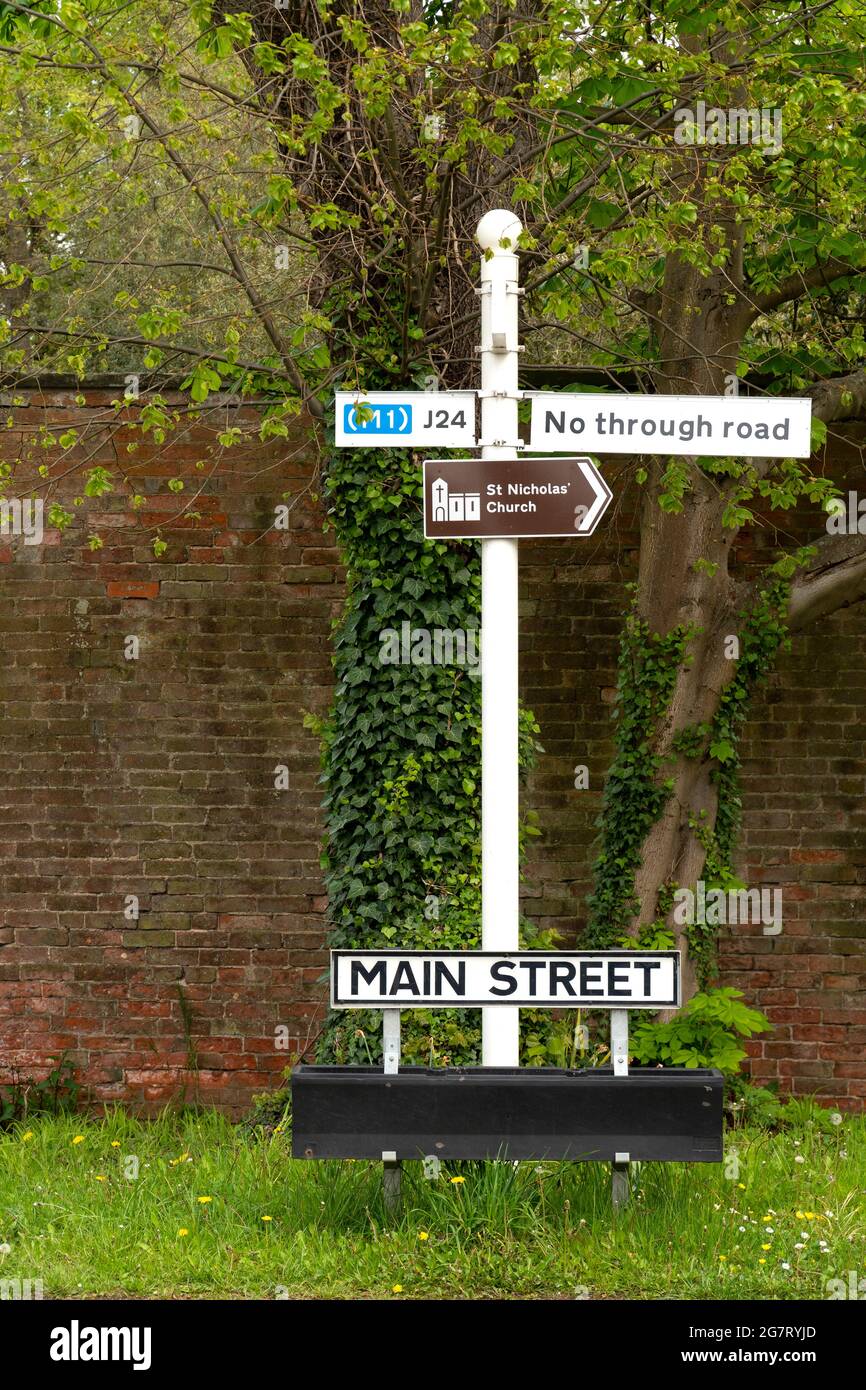 Old village sign post example Stock Photo - Alamy