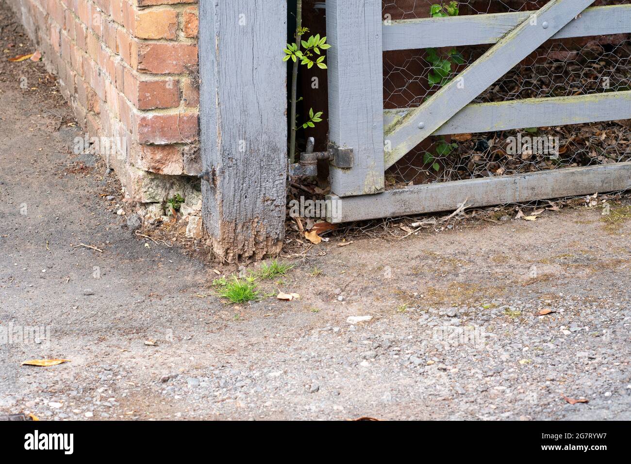 Old rotting gate post example Stock Photo - Alamy