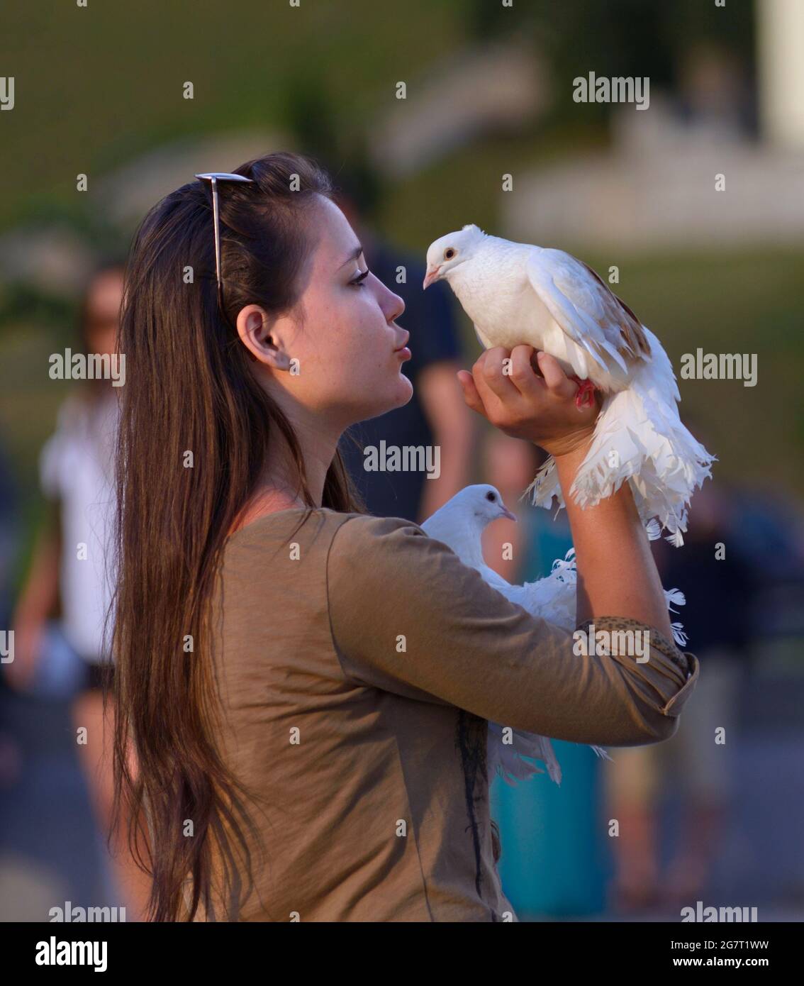 Girl with doves hi-res stock photography and images - Alamy