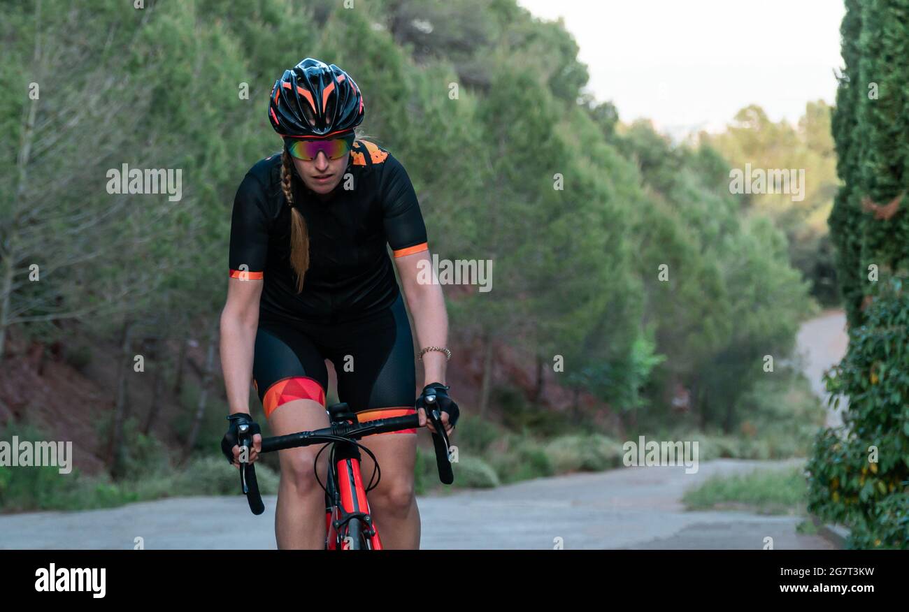 Portrait young cyclist riding hi-res stock photography and images - Alamy