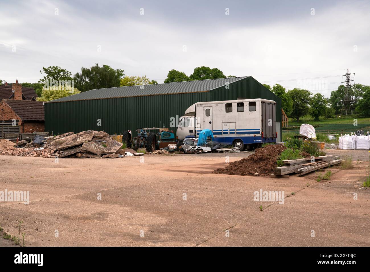 Untidy farm yard scene Stock Photo - Alamy