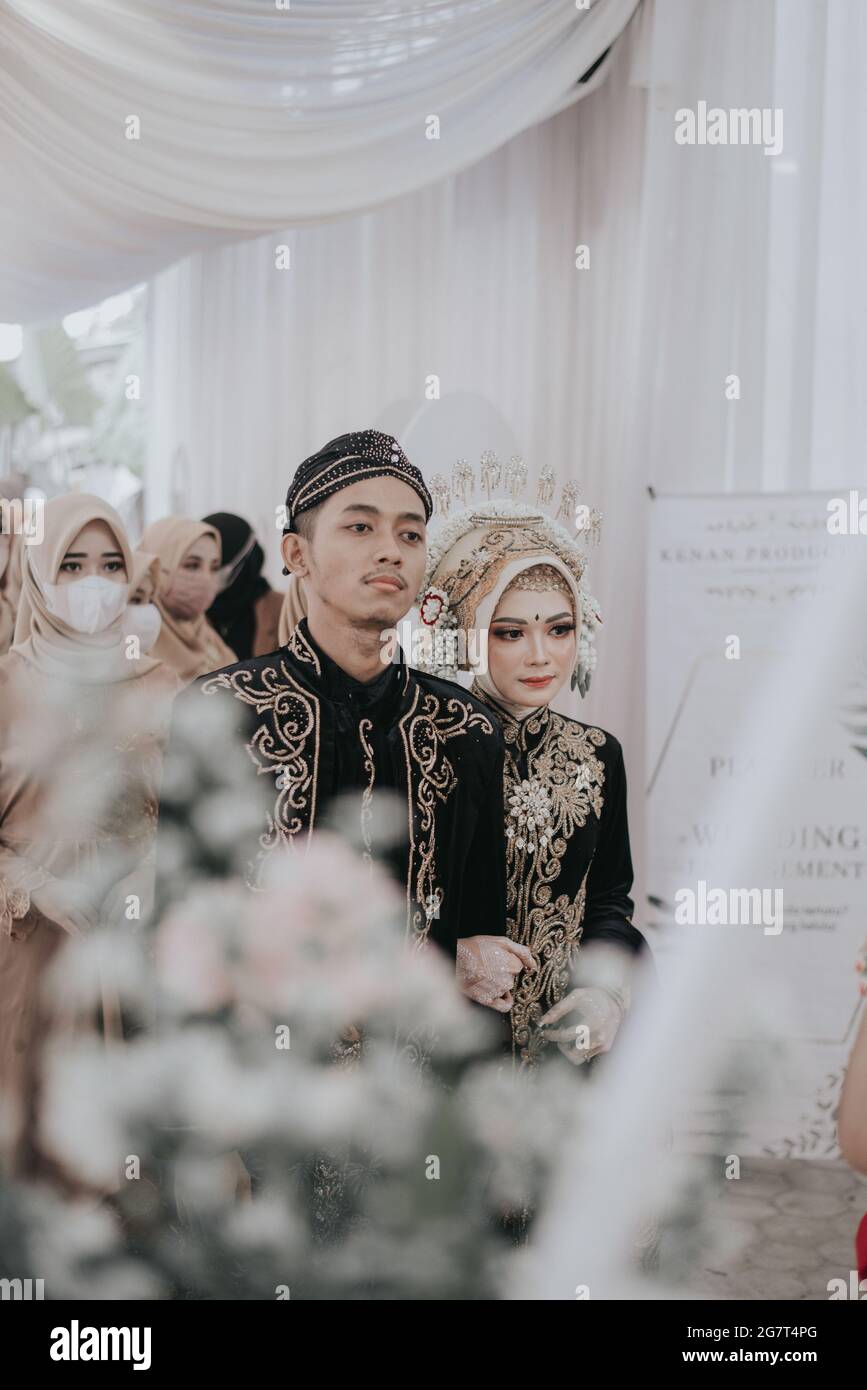 wedding using Javanese customs traditional Stock Photo - Alamy
