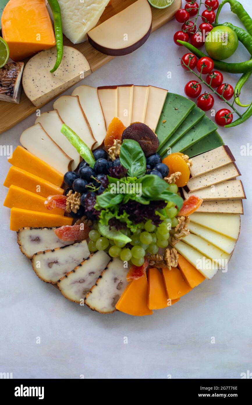 Cheese plate on a white wooden background. Cheese tasting platter ...