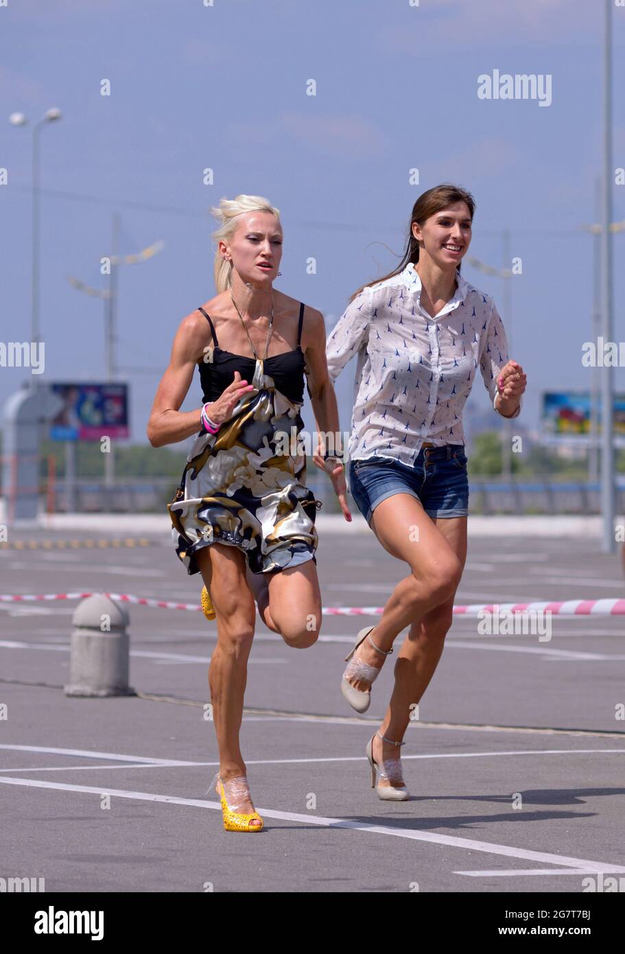 High heel race hi-res stock photography and images - Alamy