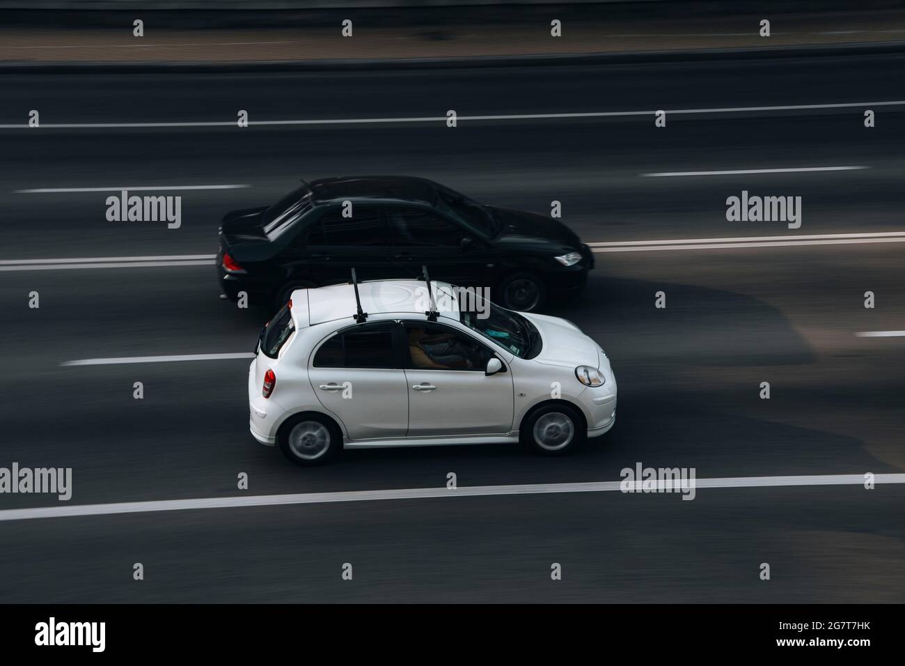 Ukraine, Kyiv - 16 July 2021: White Nissan Micra car moving on the ...