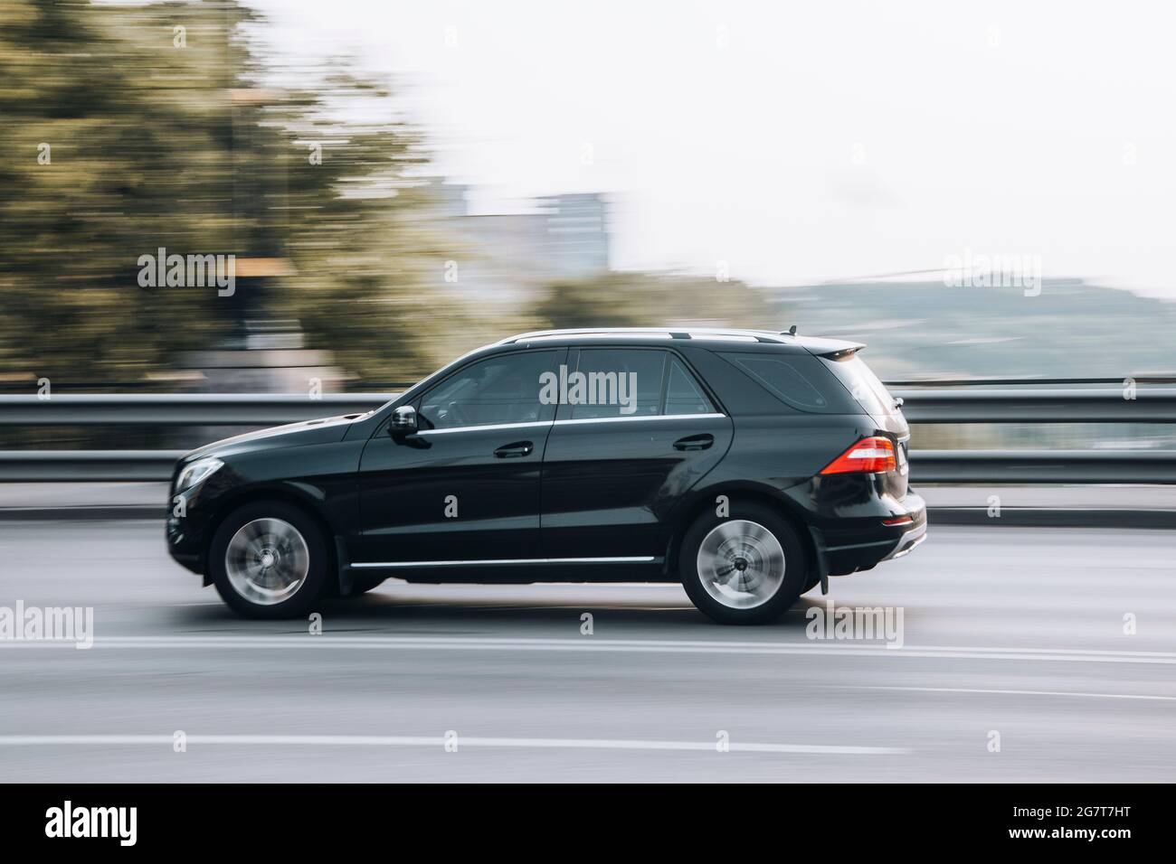 Ukraine, Kyiv - 16 July 2021: Black Mercedes-Benz M-Class car moving on ...
