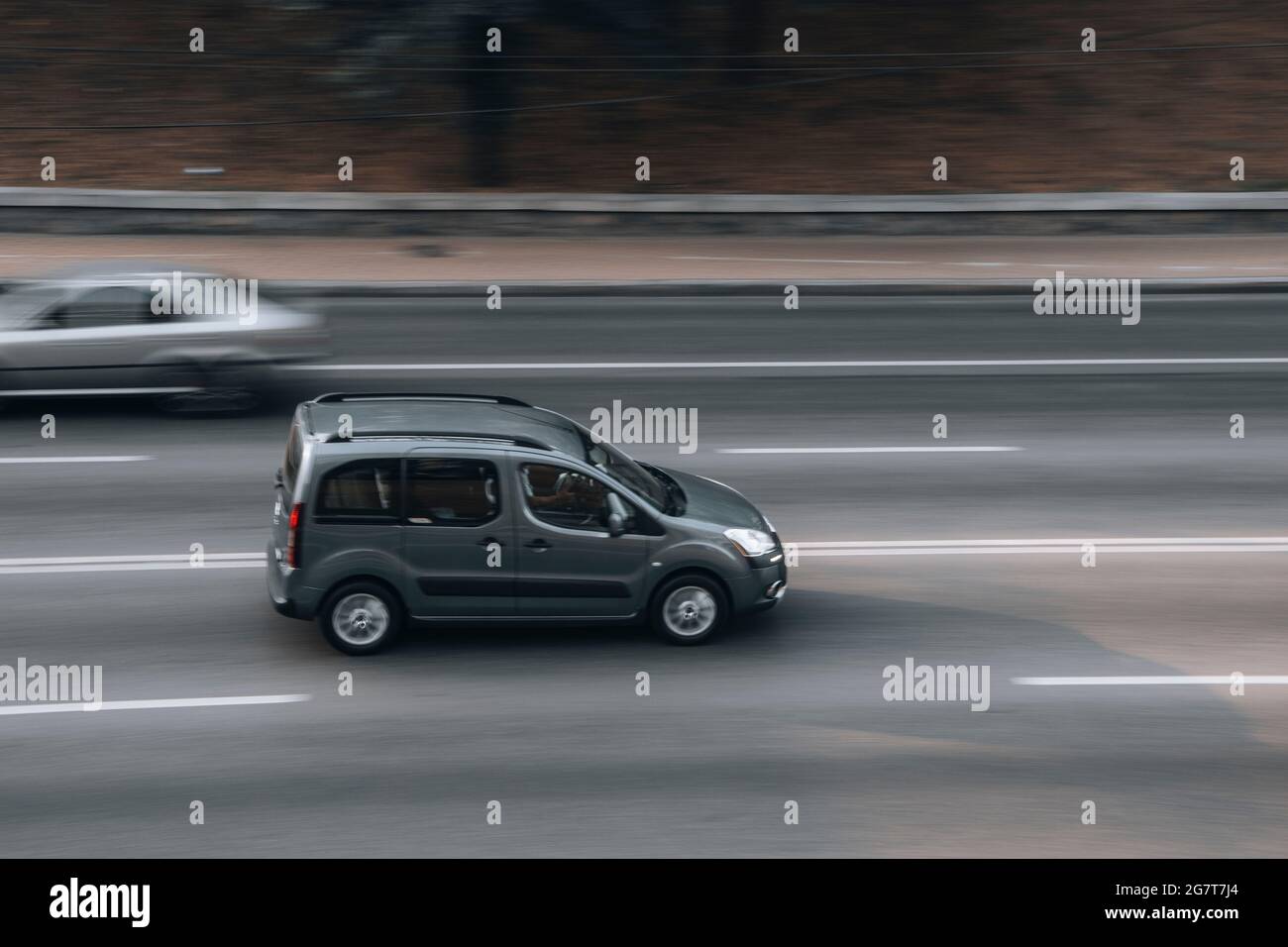 Ukraine, Kyiv - 16 July 2021: Silver Citroen Berlingo car moving on the ...