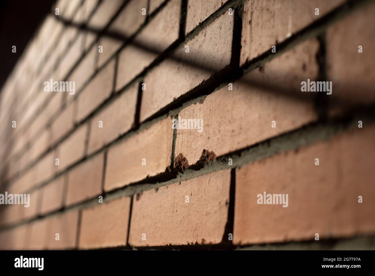 Brick wall cut diagonally. Brick house. Masonry Stock Photo - Alamy