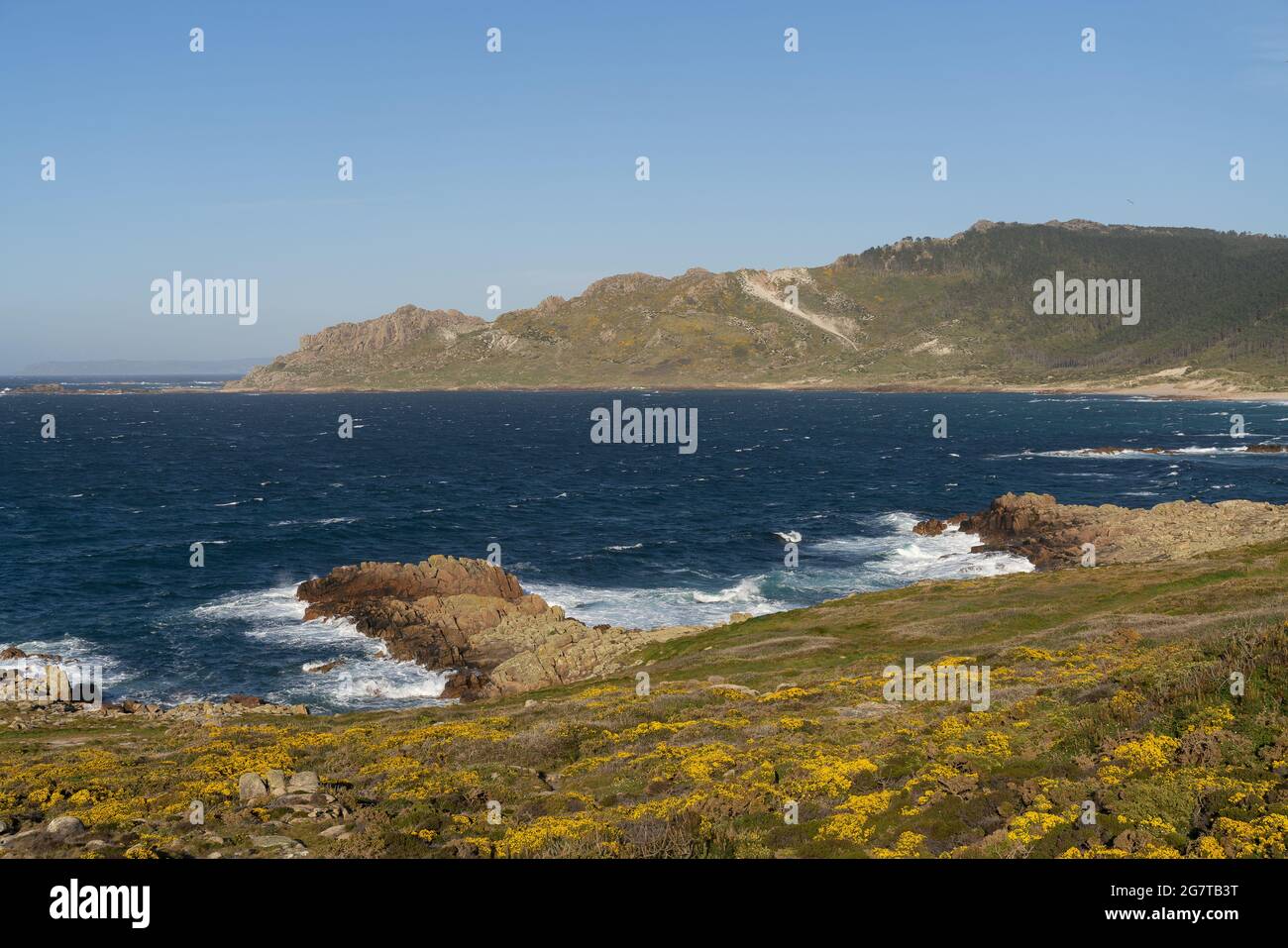 Blue ocean watering the cliffs in Galicia Stock Photo - Alamy