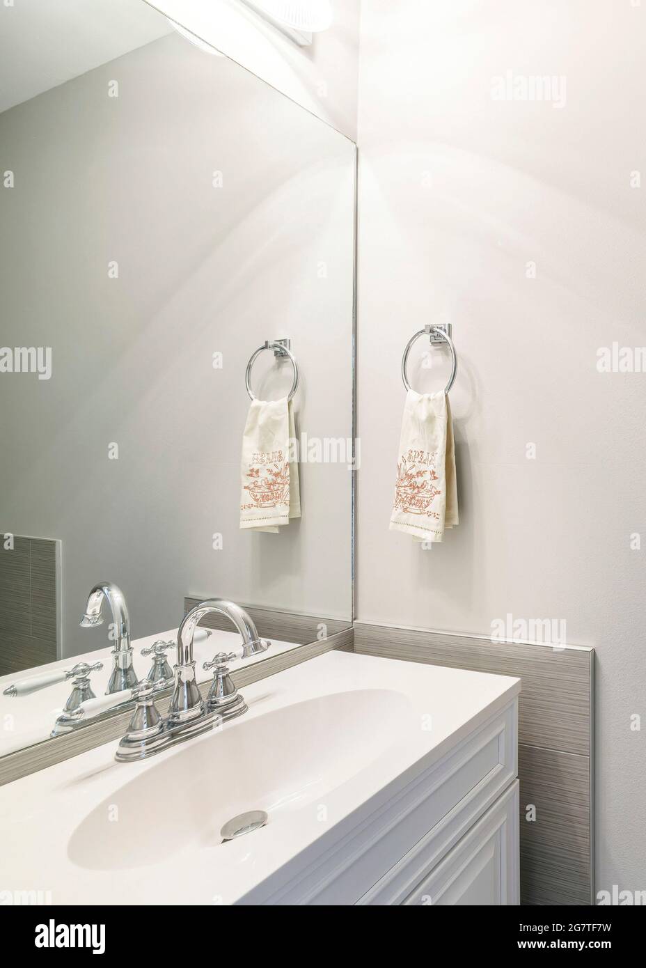 Vertical Modern bathroom vanity sink with stainless fixtures Stock ...