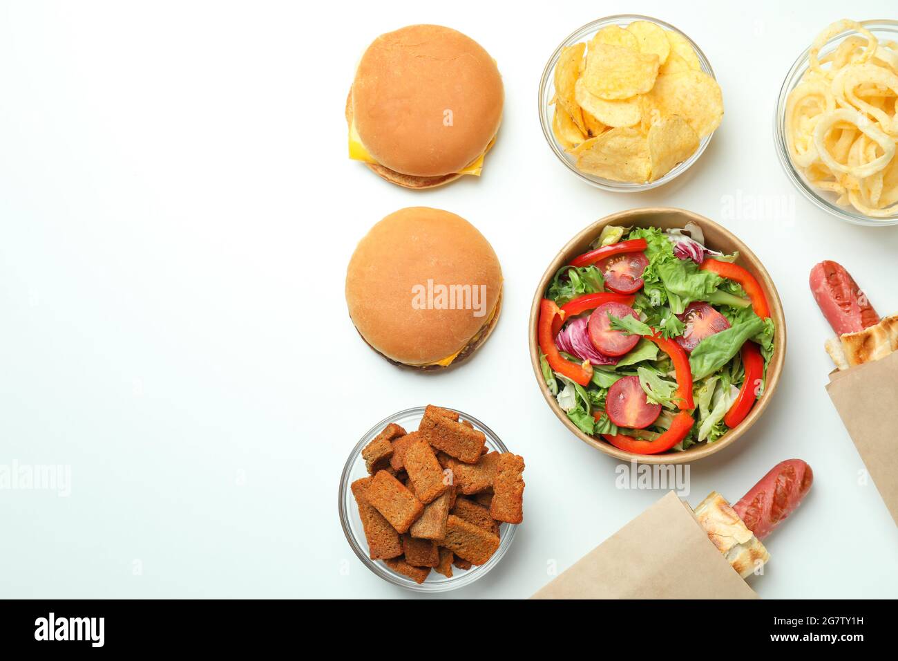 Concept of fast food on white background Stock Photo - Alamy