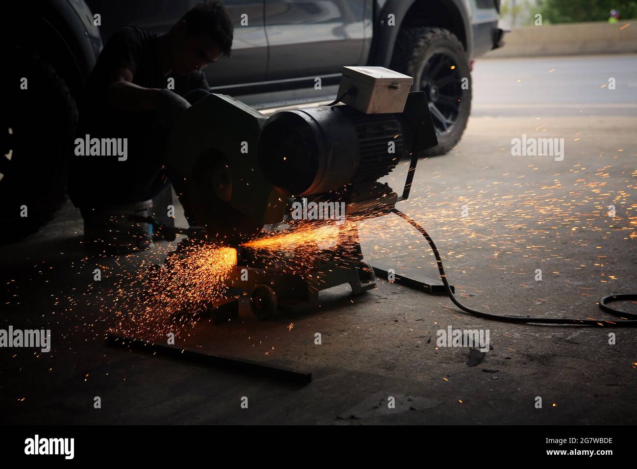 Welder used grinding stone on steel in factory with sparks, Welding ...