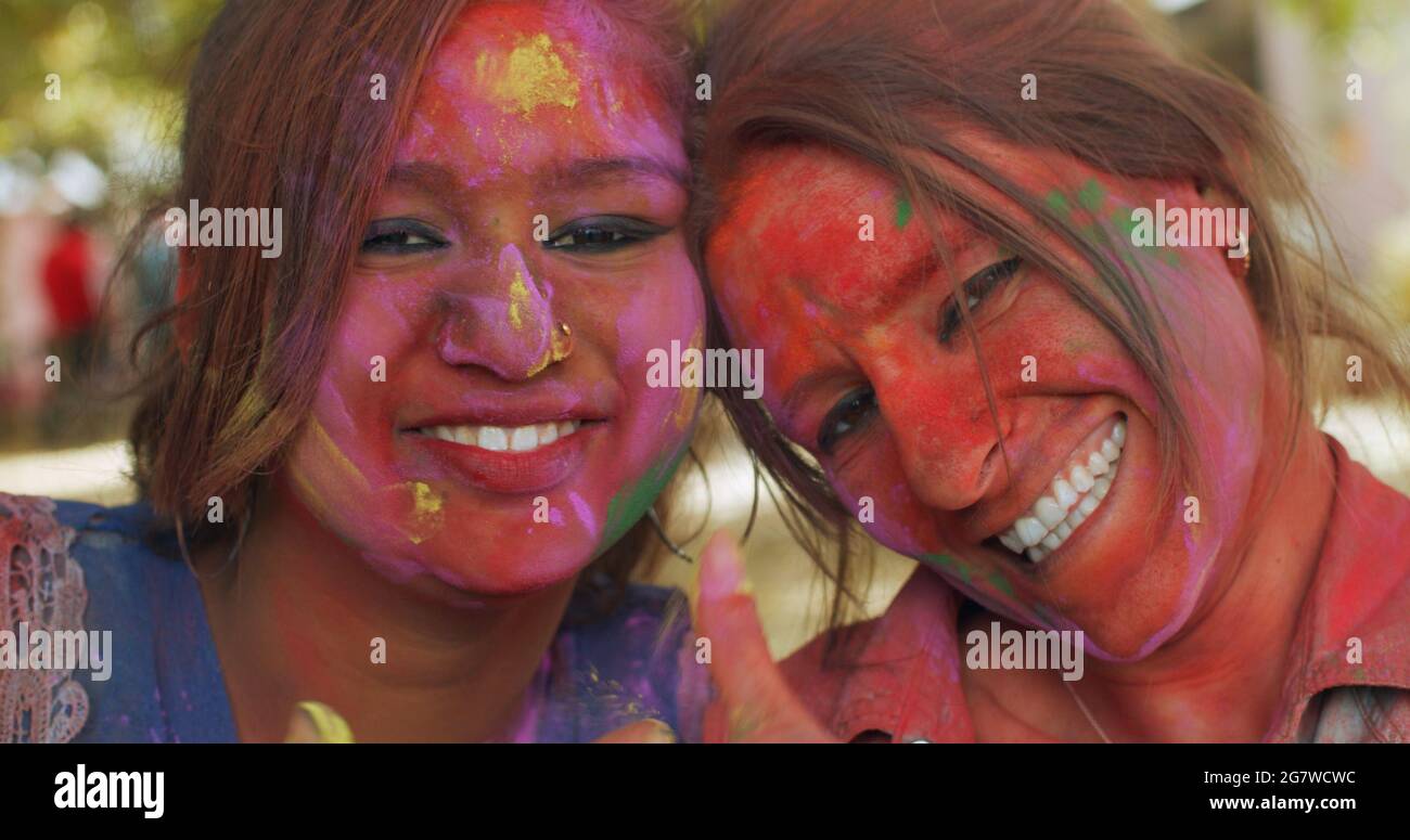 Group of people having fun during the Holi Hindu festival of Color in ...