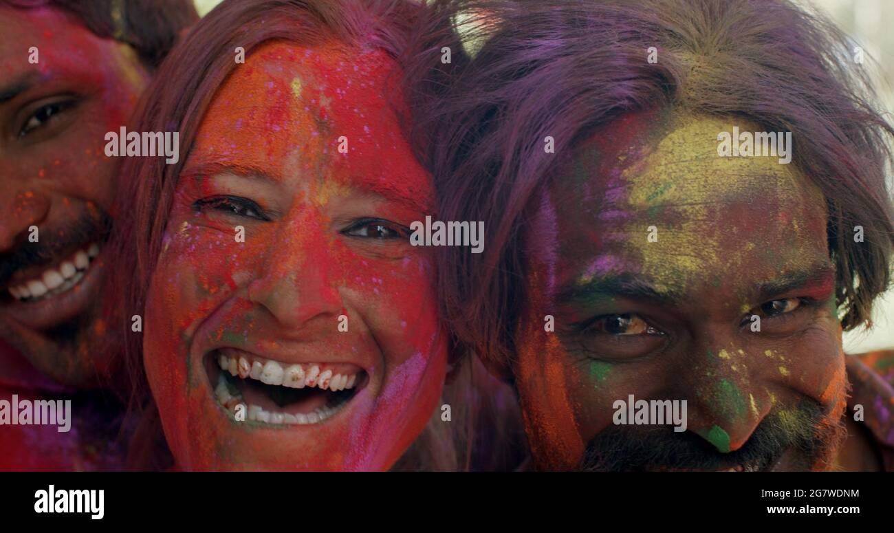 Group of people having fun at the Holi Hindu festival of Color in India ...
