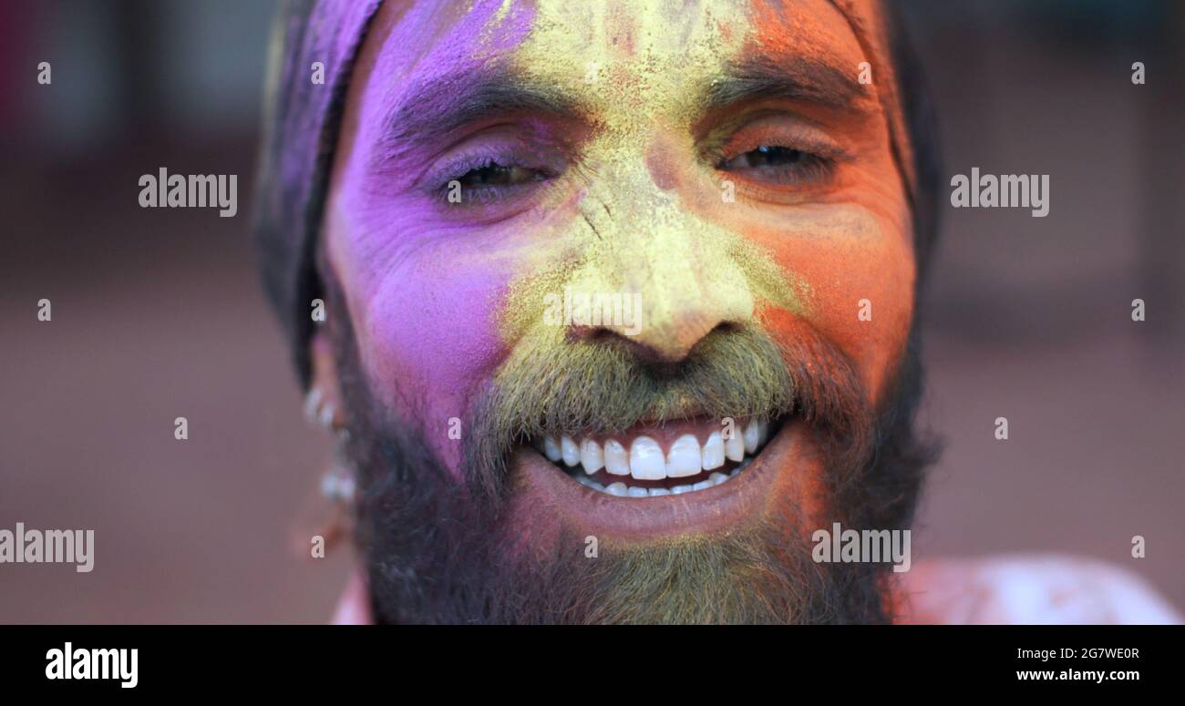 Male with a painted face at the Holi Hindu festival of Color in India ...