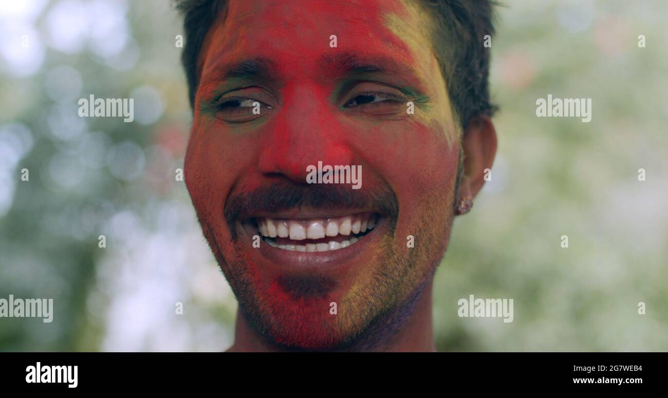 Male with a painted face at the Holi Hindu festival of Color in India ...
