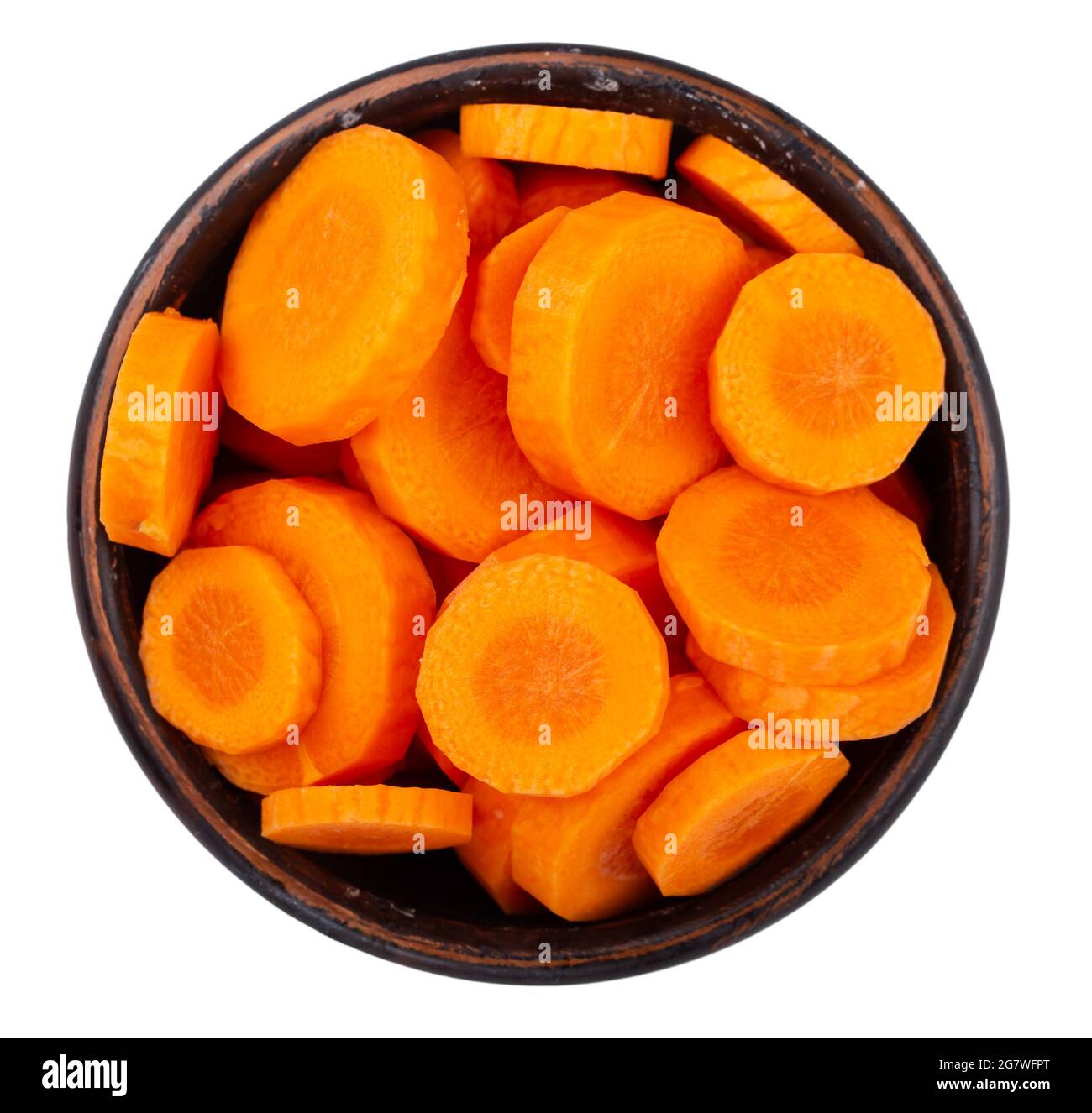 Sliced carrots in a bowl Isolated on white background. Fresh cut crisp ...