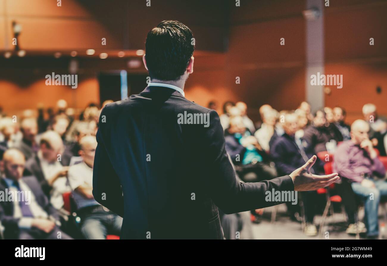 Speaker giving a talk at business conference meeting Stock Photo - Alamy