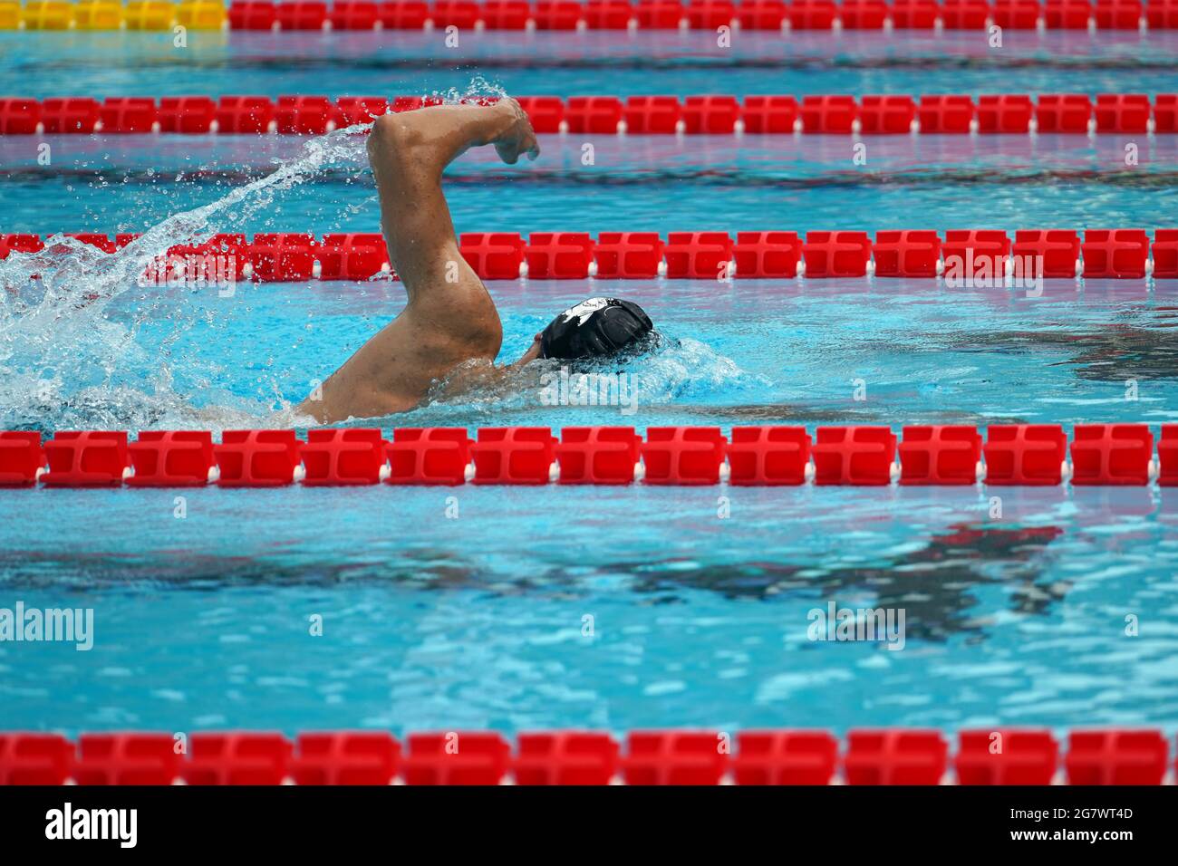 Young male swimming laps hi-res stock photography and images - Alamy