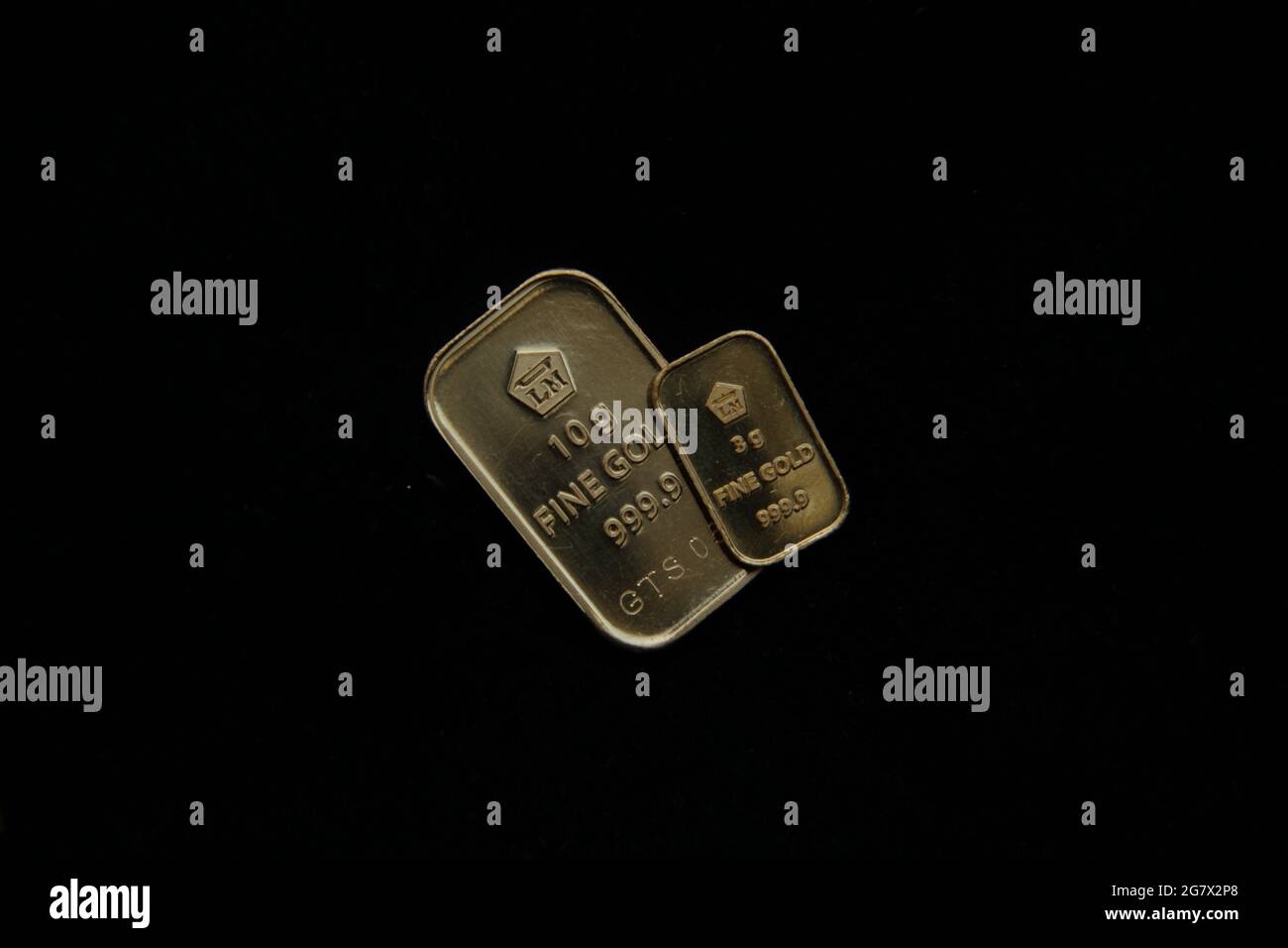 Fine gold bar (goldbar) on black background, produced by PT Aneka ...
