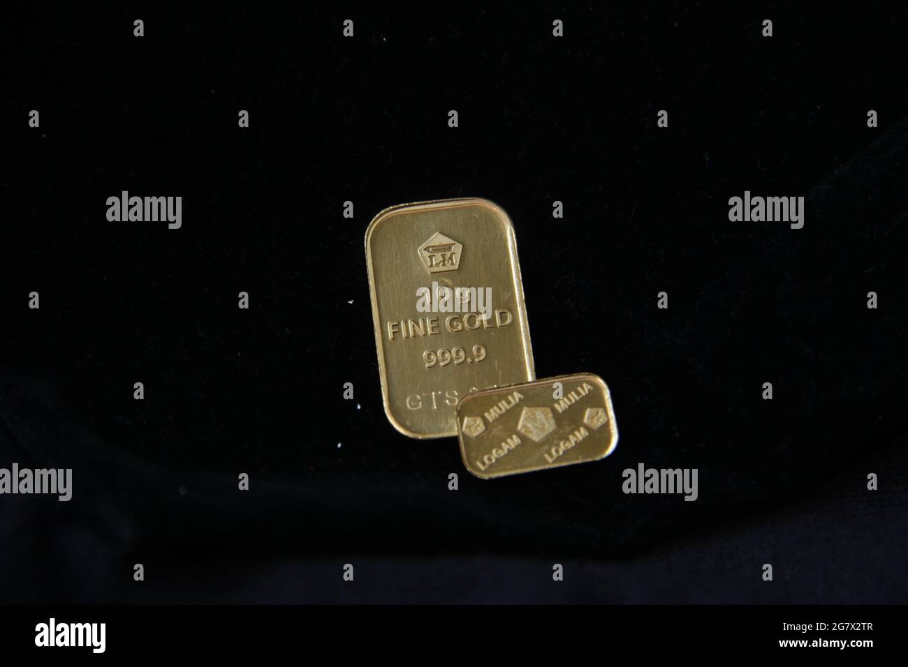 Fine gold bar (goldbar) on black background, produced by PT Aneka ...