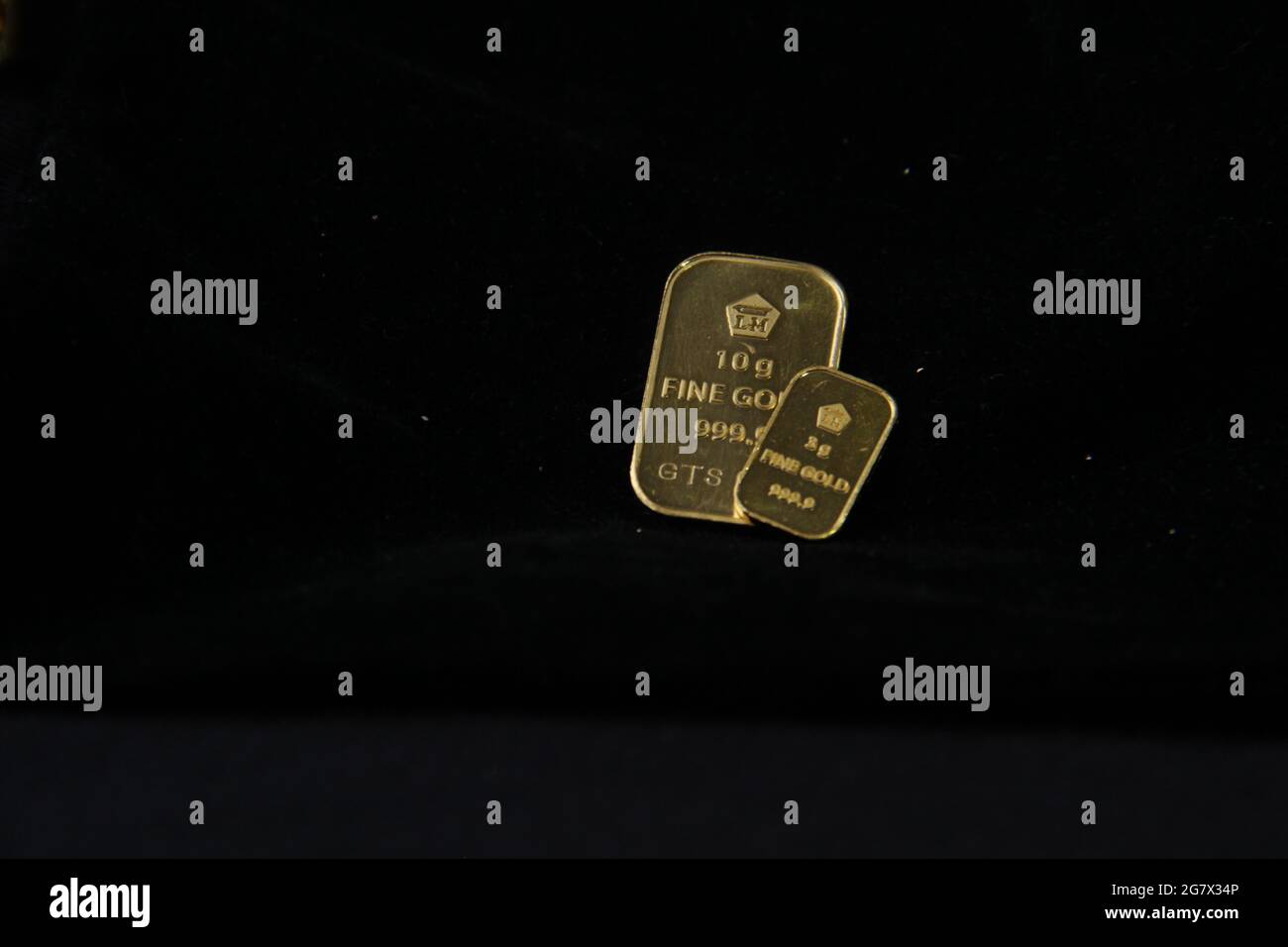 Fine gold bar (goldbar) on black background, produced by PT Aneka ...