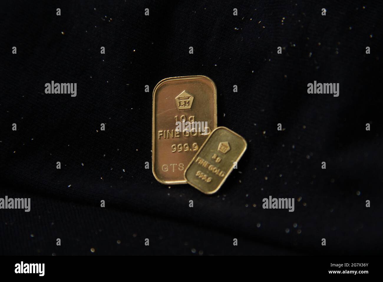Fine gold bar (goldbar) on black background, produced by PT Aneka ...