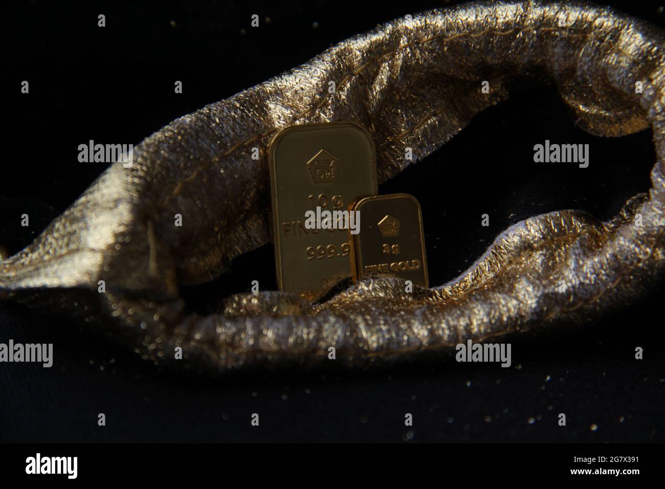 Fine gold bar (goldbar) on black background, produced by PT Aneka ...
