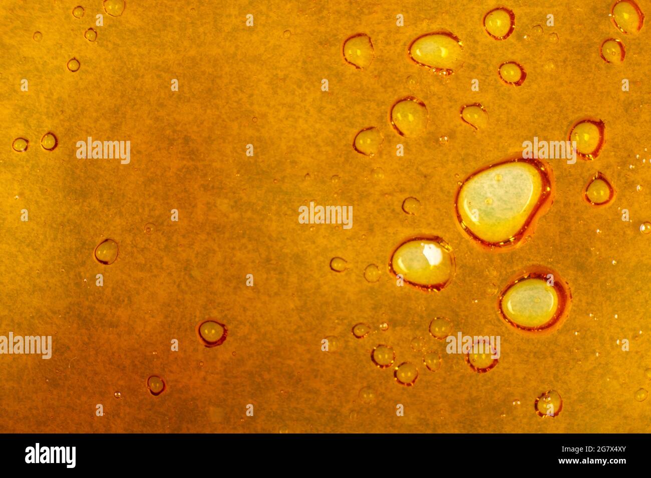 texture golden cannabis wax, marijuana dab macro background Stock Photo ...