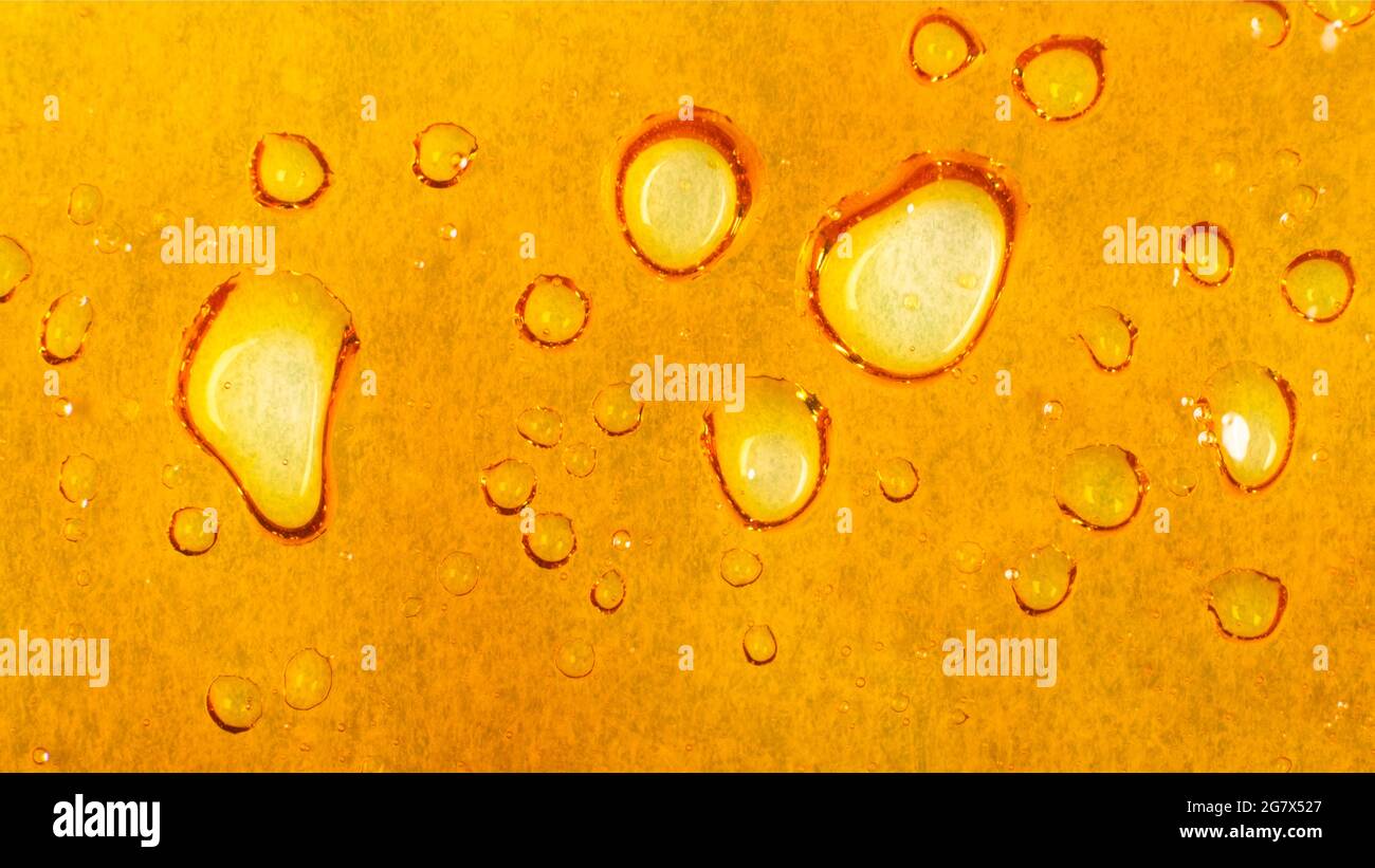 texture gold wax cannabis , marijuanna dab background Stock Photo - Alamy