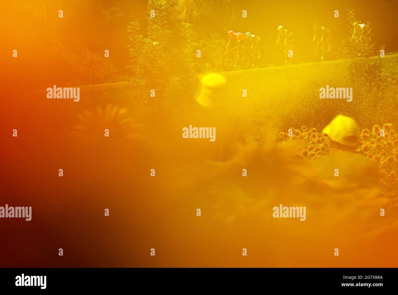 Libourne, France. 16th July, 2021. The break ride through the sunflower ...