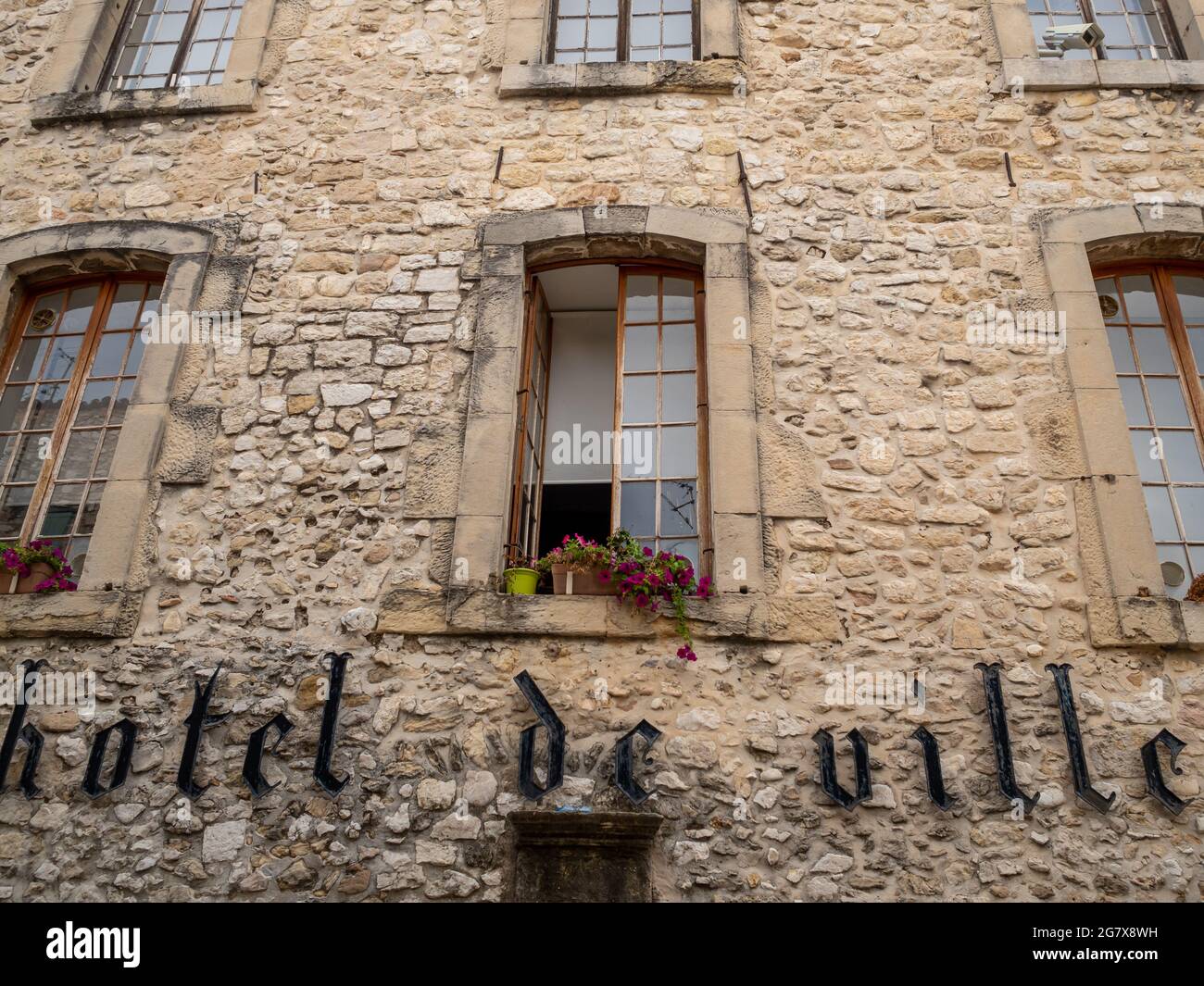 traditional stone house facade in small provencal village in the French ...