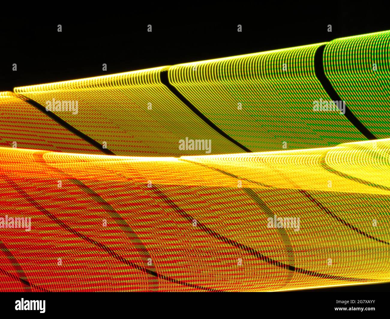 Gradual rhythmic light trajectory on the black background Stock Photo ...