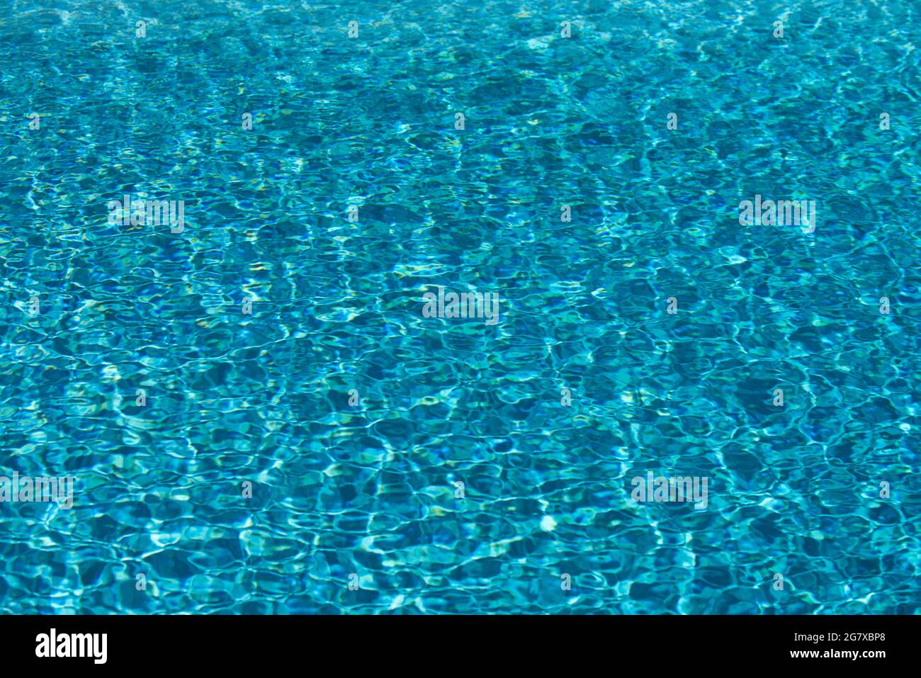Water background. Blue water, ripples and highlights. Texture of water ...