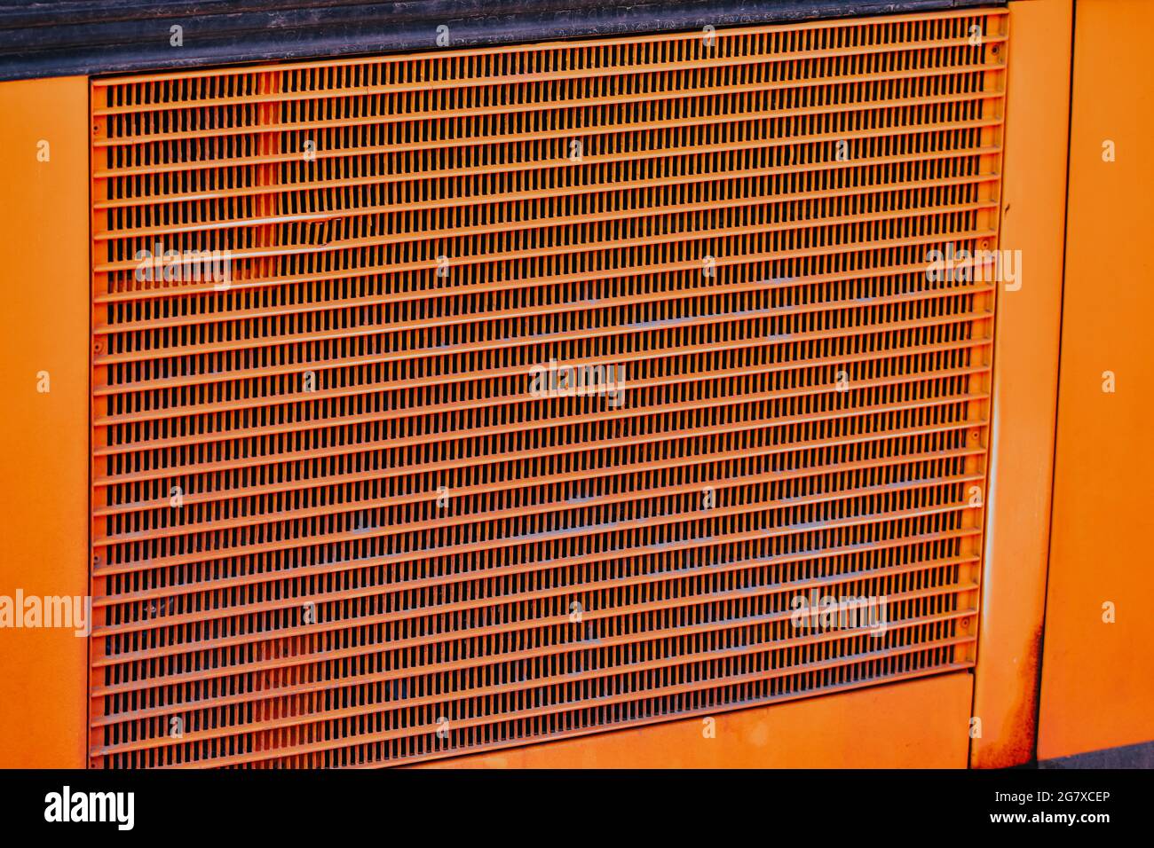 Yellow air conditioner radiator Stock Photo - Alamy