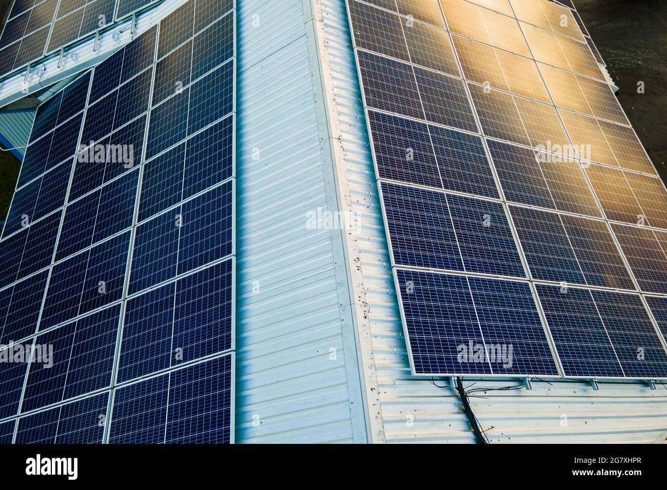Aerial view of surface of blue photovoltaic solar panels mounted on ...