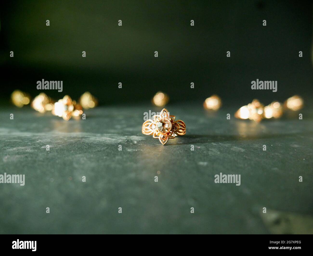 Lady hand ornament displayed isolated at black backdrop with multiple ...